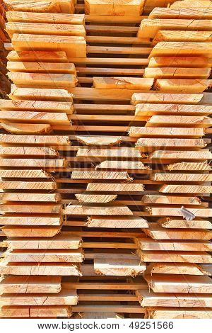 Stack of new wooden studs at the lumber yard - Stock Image - Everypixel